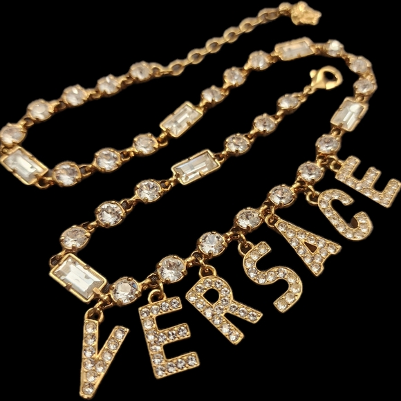 Versace | Jewelry | Versace Crystal Logo Embellished Gold Necklace ...